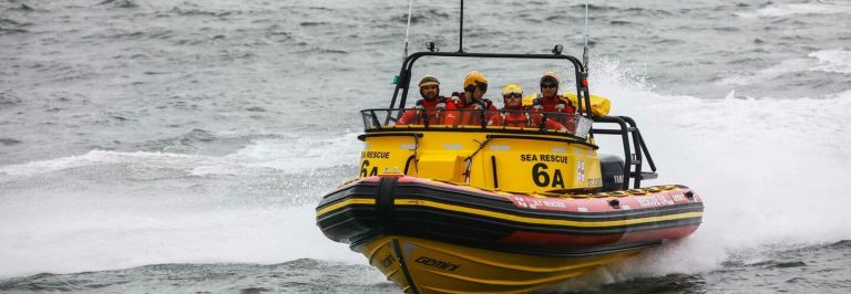 NSRI swimmer, paramedic hoisted onto fishing boat by helicopter to ...